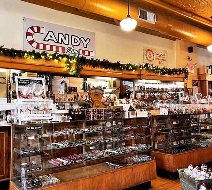 The candy shop section is a wonderland of glass cases filled with handmade chocolates and nostalgic treats that would make Willy Wonka himself green with envy.