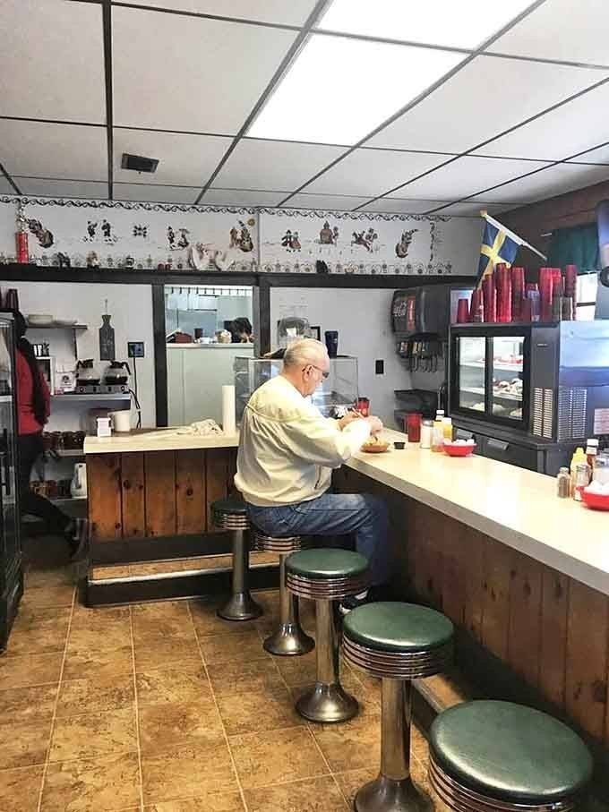 The counter offers front-row seats to the kitchen action, where green vinyl stools have supported generations of hungry patrons.