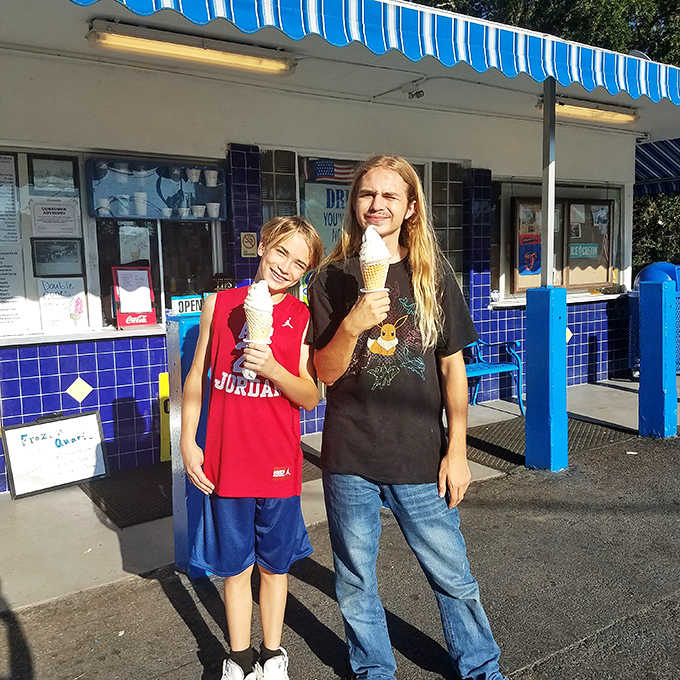 Happy customers enjoying their frozen treasures &ndash; the universal language of ice cream bringing smiles across generations.