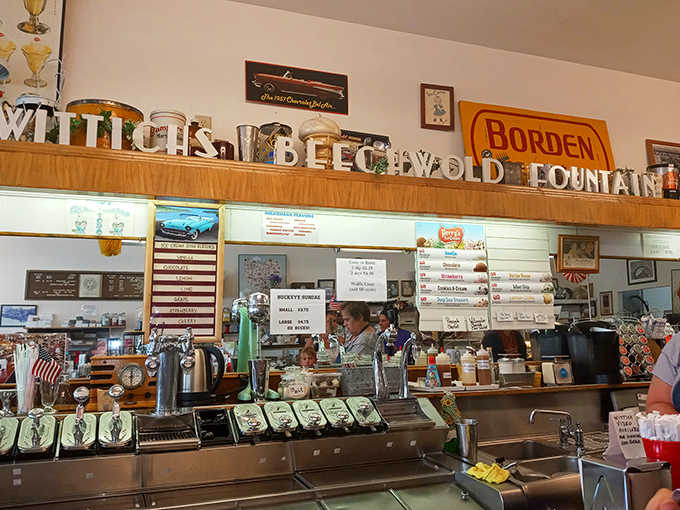 Vintage signs and memorabilia line the walls above the counter &ndash; silent storytellers of a sweet legacy that's been unfolding since before your grandparents were born.