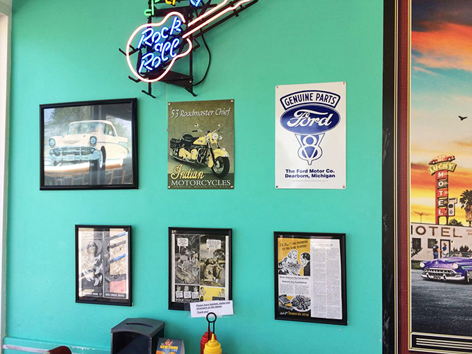 The mint-green walls serve as the perfect backdrop for vintage automotive signs and neon lights &ndash; a museum of Americana where you can also get a great meal.