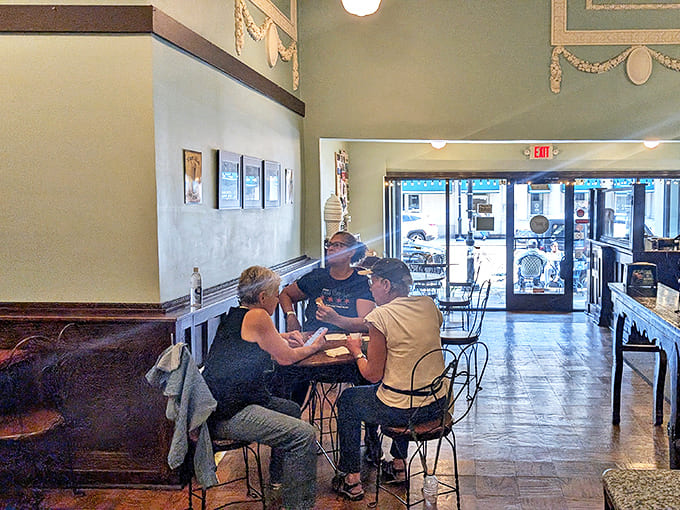 Families gathering around small tables, creating ice cream memories that'll last longer than the sugar rush, probably.