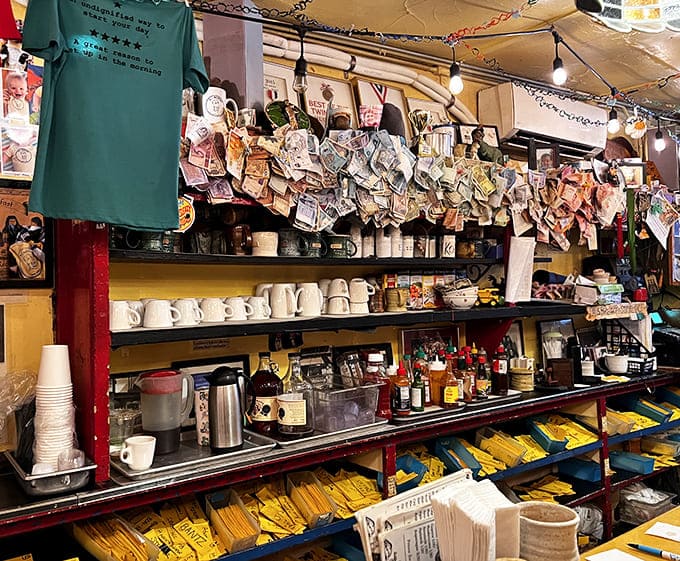 Dollar bills adorning the walls tell stories of countless satisfied customers &ndash; a currency-based guest book spanning decades of dining.