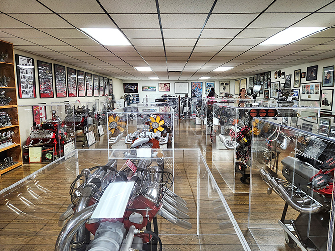 These gleaming engines under plexiglass are like mechanical jewelry, showcasing the artistry behind the horsepower that made drag racing legends.