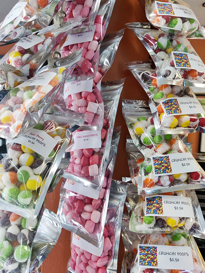 Candy bags lined up like sweet soldiers – "Crunchy Poofs" and marshmallow treats waiting to ambush your diet plans.