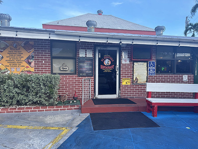 The unassuming entrance hides one of Key West's greatest culinary treasures &ndash; like finding the doorway to a parallel universe where lunch is always perfect.