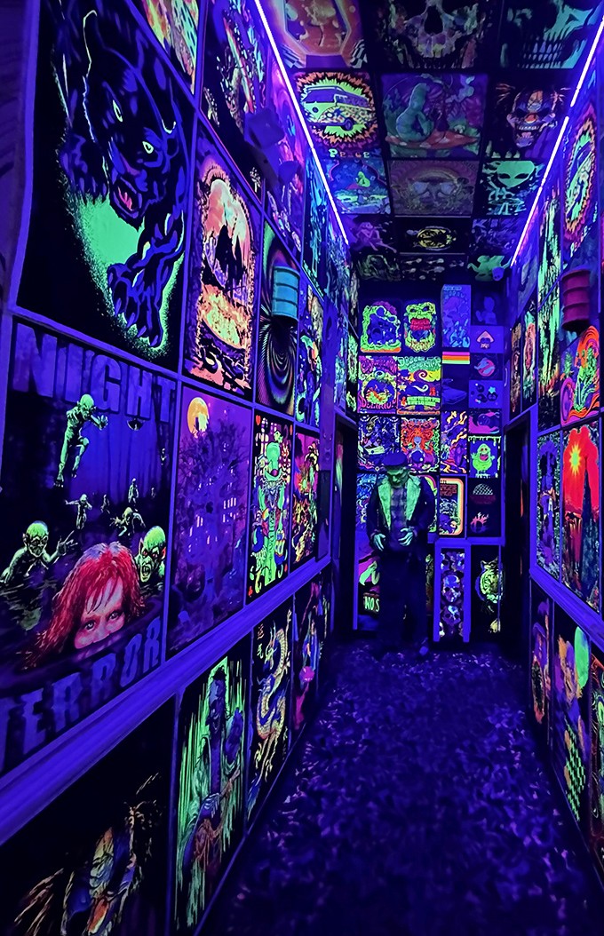 Walking through this blacklight hallway feels like entering another dimension&mdash;horror icons and neon monsters create an immersive path to gaming nirvana.