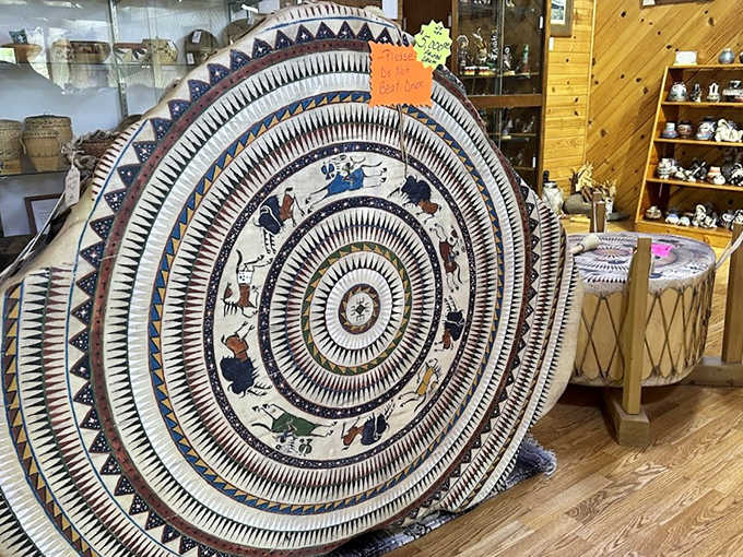 The circular design of this traditional hide drum represents the continuing cycle of life, crafted with techniques passed down through generations.