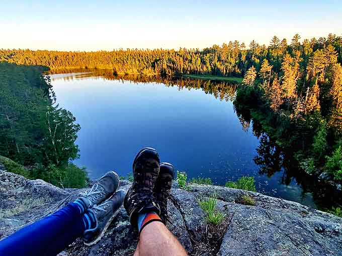 Hikers' reward: dangling tired feet over crystalline waters from a rocky perch &ndash; nature's version of the perfect end-of-day recliner.