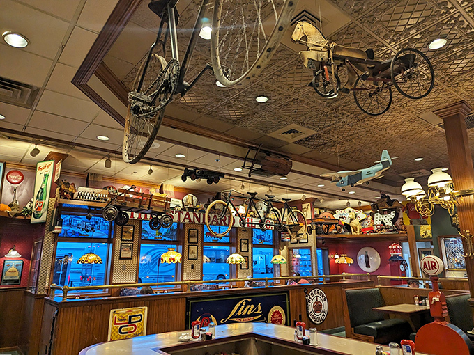 Counter seating offers front-row views of the action, with classic diner stools and memorabilia creating a timeless Americana vibe.