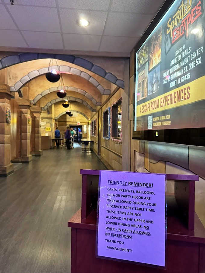 The castle's interior hallway, designed like medieval stone corridors, transports visitors from suburban Illinois to fantasy realms.
