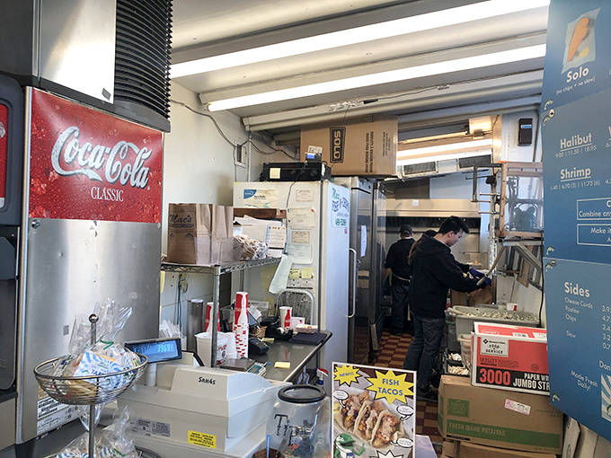 The kitchen reveals the source of those mouthwatering aromas&mdash;a glimpse behind the scenes where seafood transforms into golden perfection.