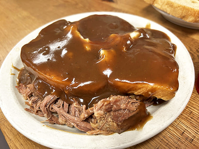Open-faced roast beef that makes no apologies for its gravy lake &ndash; the kind of meal that demands a nap afterward.