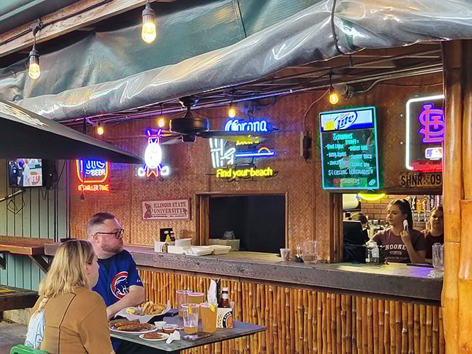 The tiki-inspired bar area offers a casual vibe where stories of tenderloin conquests are shared over cold drinks.