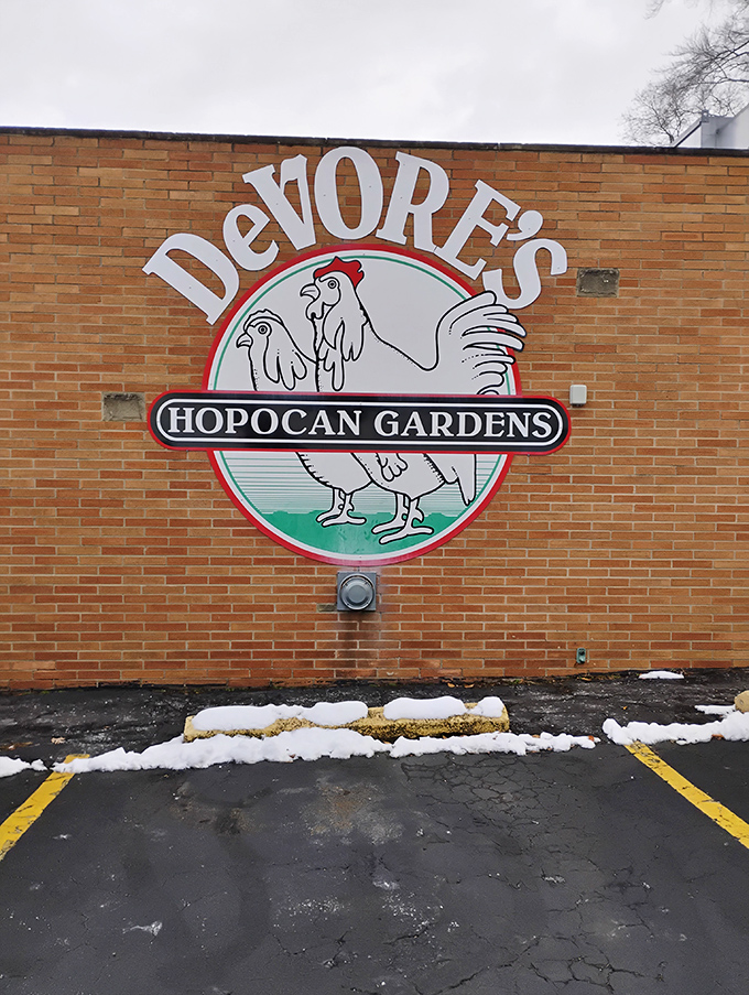 The iconic DeVore's Hopocan Gardens sign promises chicken so good, you'll be tempted to hug the building on your way out.