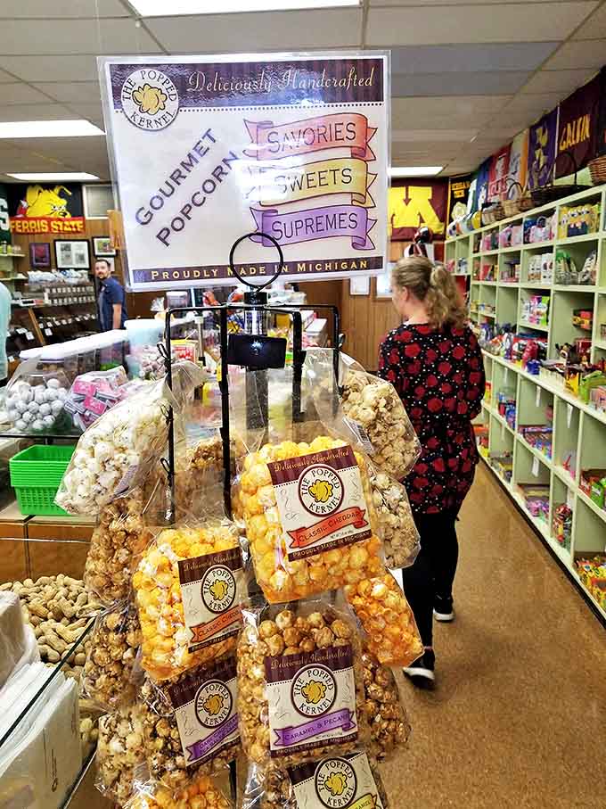 Gourmet popcorn dangles in tempting bags, showcasing flavors from classic caramel to adventurous combinations that elevate this simple snack.