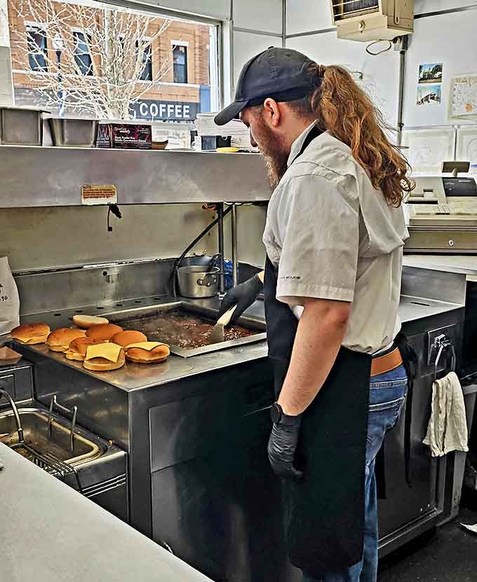 Behind every great burger is someone who's mastered the griddle dance &ndash; flipping, seasoning, and assembling with the confidence of experience.