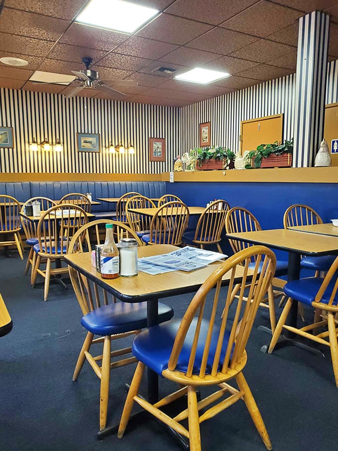 Windsor chairs and blue bench seating create the perfect backdrop for morning newspapers, endless coffee refills, and solving the world's problems.
