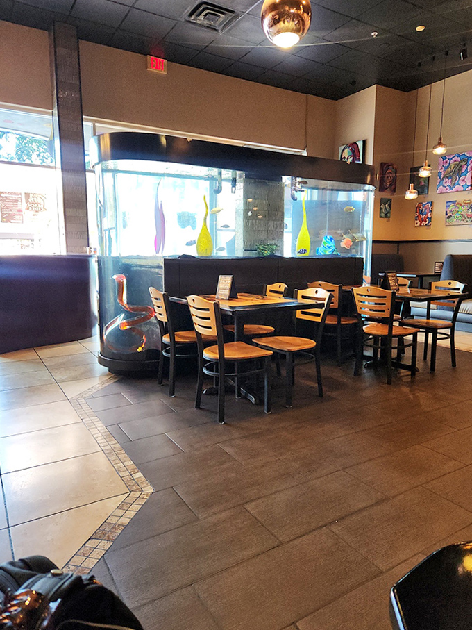 Wooden chairs and comfortable booths surround tables where culinary masterpieces are served daily to appreciative audiences.