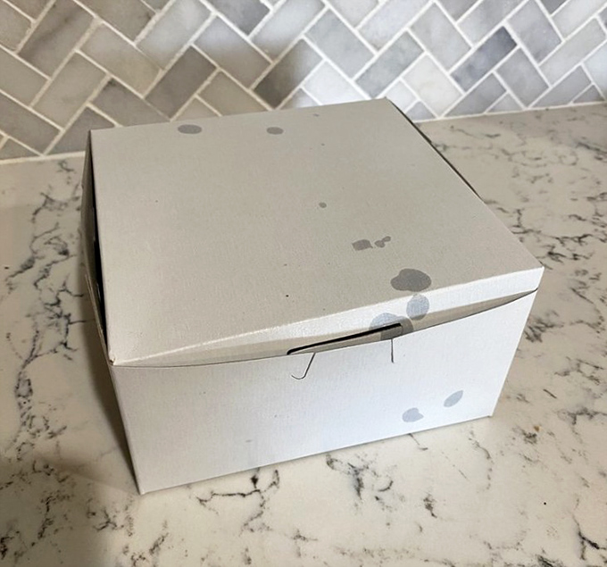 The humble white box that holds treasure – Fast Eddie's packaging may be simple, but what's inside is culinary gold.