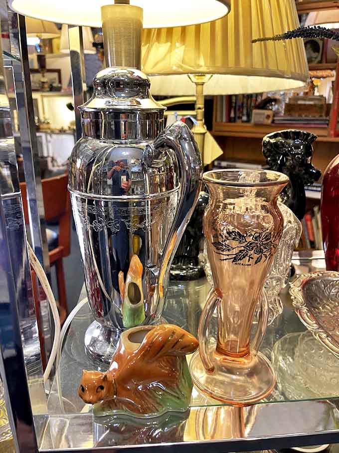 Elegant vases and decorative pieces create a still life worthy of a painting, their varied shapes and materials showcasing craftsmanship from different periods.