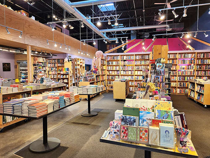 The store's vibrant design creates an atmosphere where browsing becomes an event, not just a transaction on the way to reading.