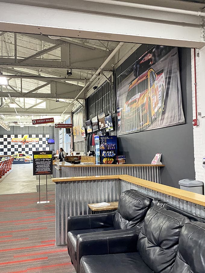 The waiting area offers a moment of calm before the storm, where racing strategies are contemplated and friendly trash talk begins.