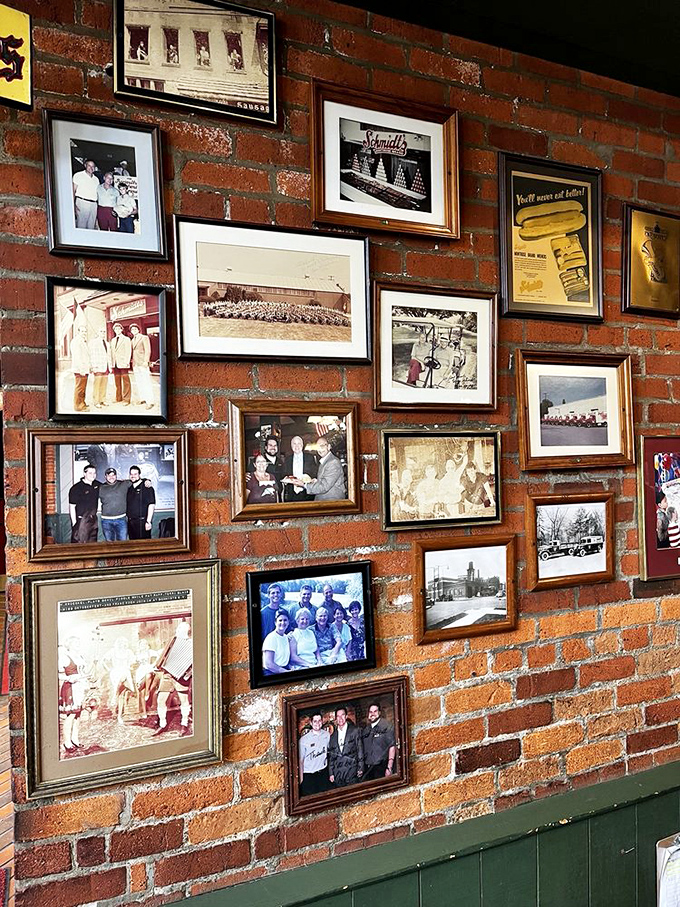 The wall of memories tells Schmidt's story through decades of photographs, creating a visual timeline of this beloved Columbus institution.