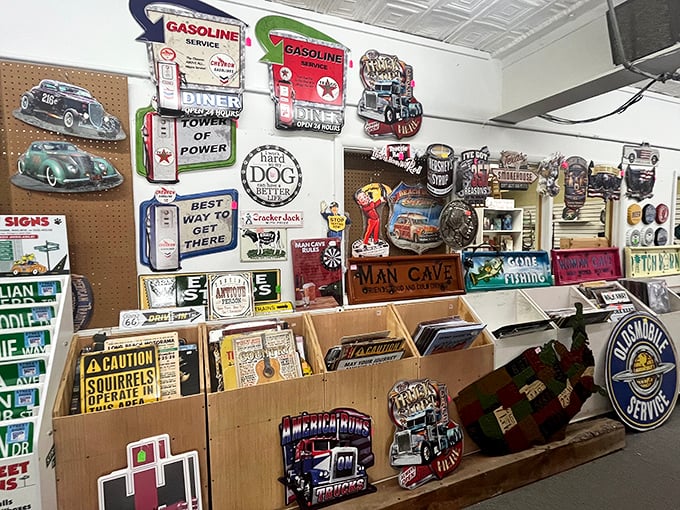 Wall-to-wall nostalgia – vintage signs and automotive memorabilia transform ordinary walls into galleries of American advertising history.