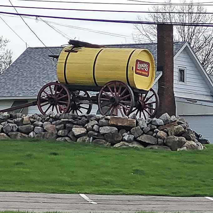 The iconic yellow barrel wagon perched on stone announces your arrival at Lehman's, a landmark that says "ordinary shopping ends here."