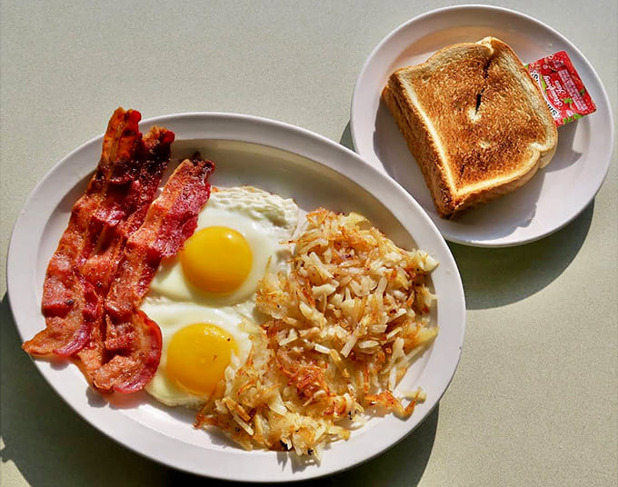 Breakfast done right&mdash;crispy-edged eggs, hash browns with the perfect crunch-to-fluff ratio, and bacon that would make a vegetarian weep.