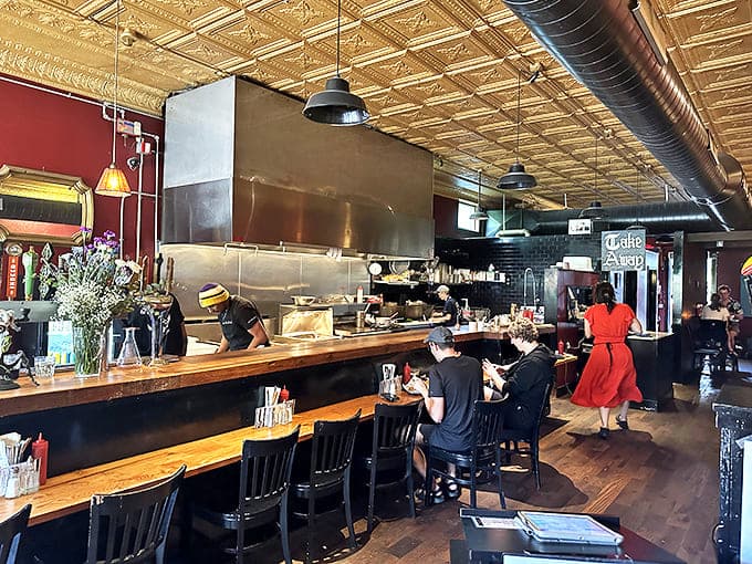 The counter seating offers a front-row view of the culinary magic happening in the open kitchen.
