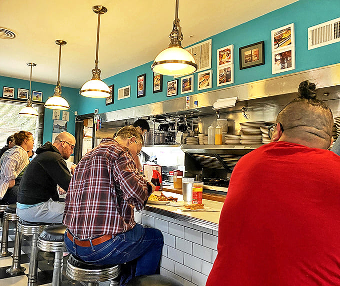 Counter seating puts you front-row for the breakfast theater, where short-order magic happens before your caffeine-craving eyes.