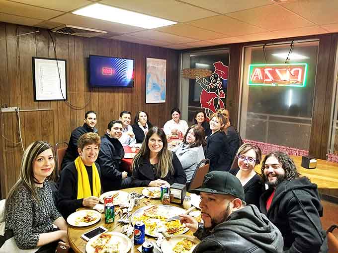 The true measure of a great local spot &ndash; tables filled with friends and families creating memories over shared slices and stories.