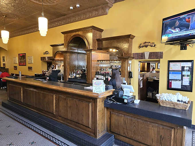 The impressive wooden bar counter feels like it could tell a thousand stories &ndash; and after nearly nine decades serving Du Quoin, it probably could.