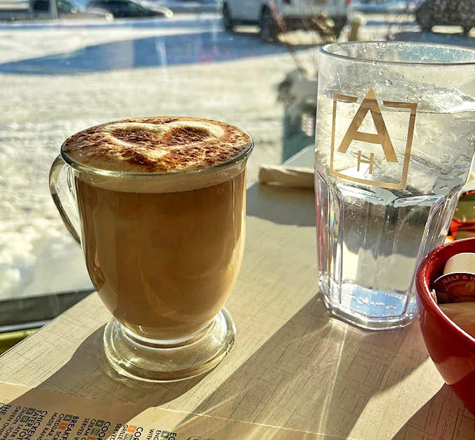 A latte that deserves its own Instagram account – frothy, aromatic, and served in a glass mug that shows off its caramel hues.