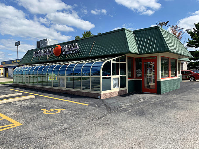 Monical's Pizza sits ready to serve up slices in its distinctive green-roofed building, because even small towns need good pizza spots.