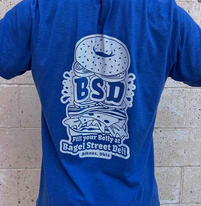Wear your bagel pride on your sleeve, or more accurately, on your back with this clever merchandise design.