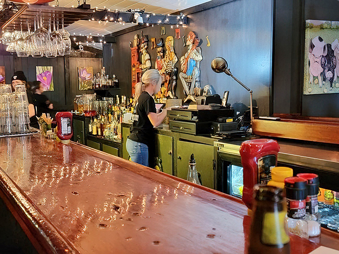 Behind the bar, mixology magic happens &ndash; each drink crafted with care and a generous pour.