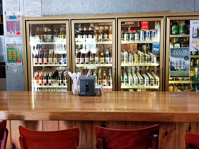 The well-stocked bar promises liquid comfort after a day on the lakes. Bartenders here pour drinks with generous hands and genuine smiles.