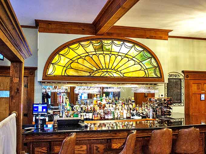 The bar area showcases stunning stained glass and rich woodwork &ndash; architectural details that whisper stories from another century.