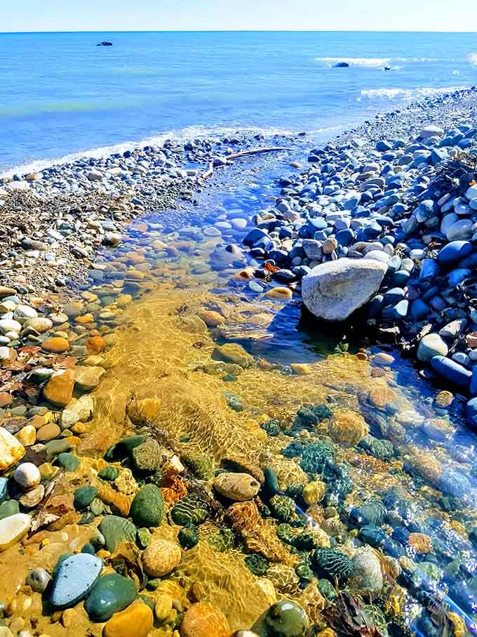 Crystal clear waters reveal a kaleidoscope of stones beneath the surface &ndash; nature's own jewelry box opened for all to admire.