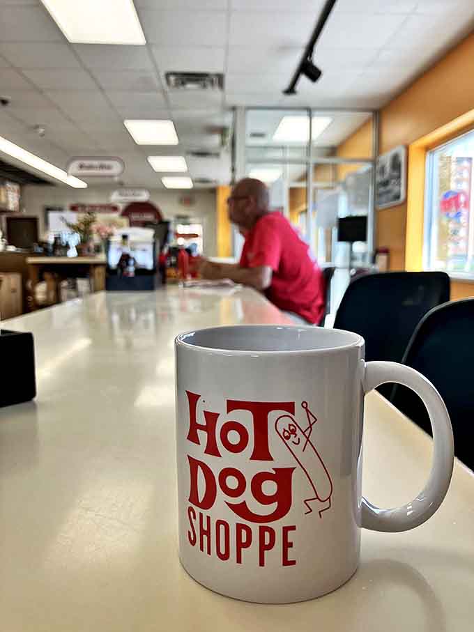 Not just a vessel for coffee, but a badge of honor that lets everyone know you've made the pilgrimage to hot dog heaven.
