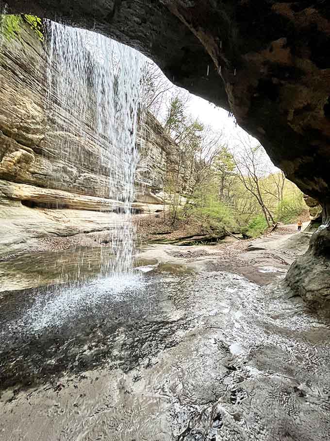 The view from inside the cave reveals the waterfall from an angle that most people never see, like finding the secret level in a video game.