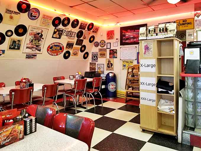 Vintage vibes: Red vinyl booths against checkerboard floors with records lining the walls &ndash; a time capsule where the coffee's always fresh.