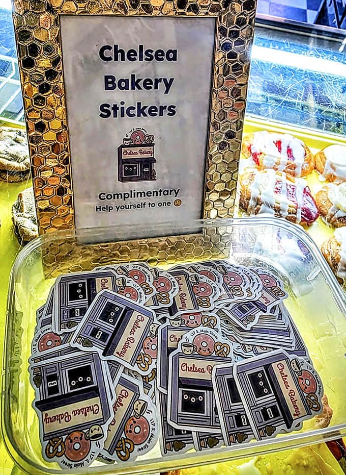 Complimentary bakery stickers add a whimsical touch&mdash;a small gesture that transforms customers into walking ambassadors for pastry perfection.