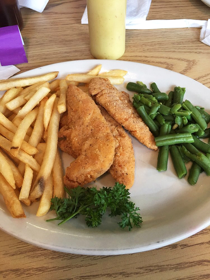 Chicken strips that put fast food versions to shame, with fries so perfectly golden they deserve their own Instagram account.