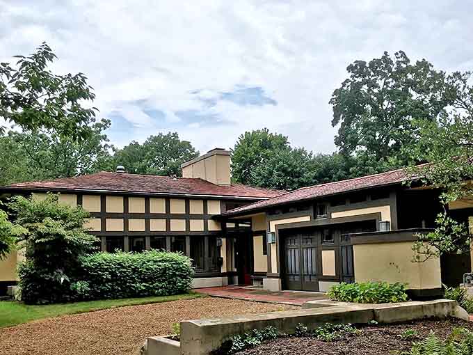 The Coonley House complex stands as one of Wright's most significant Prairie School designs, its horizontal emphasis blending with the landscape.