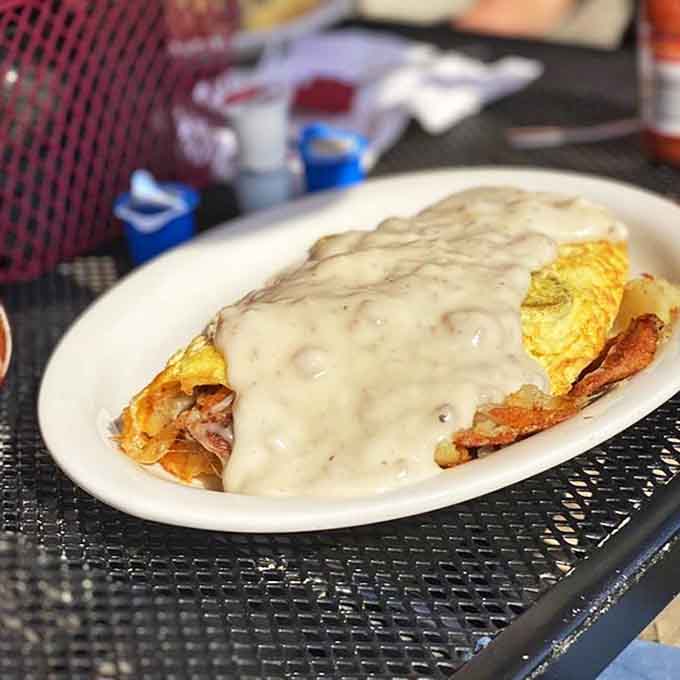 A country omelet that contains everything but the farmhouse, served with toast that's achieved golden-brown perfection.