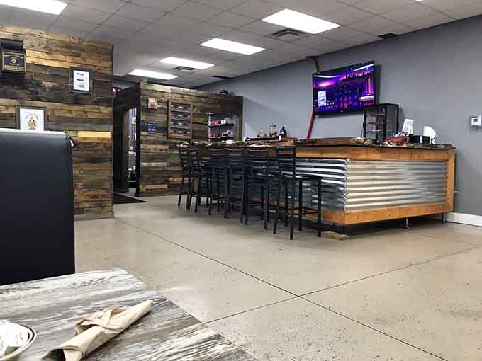 The bar area with wood paneling and flat screens, where you can watch sports while demolishing pancakes.